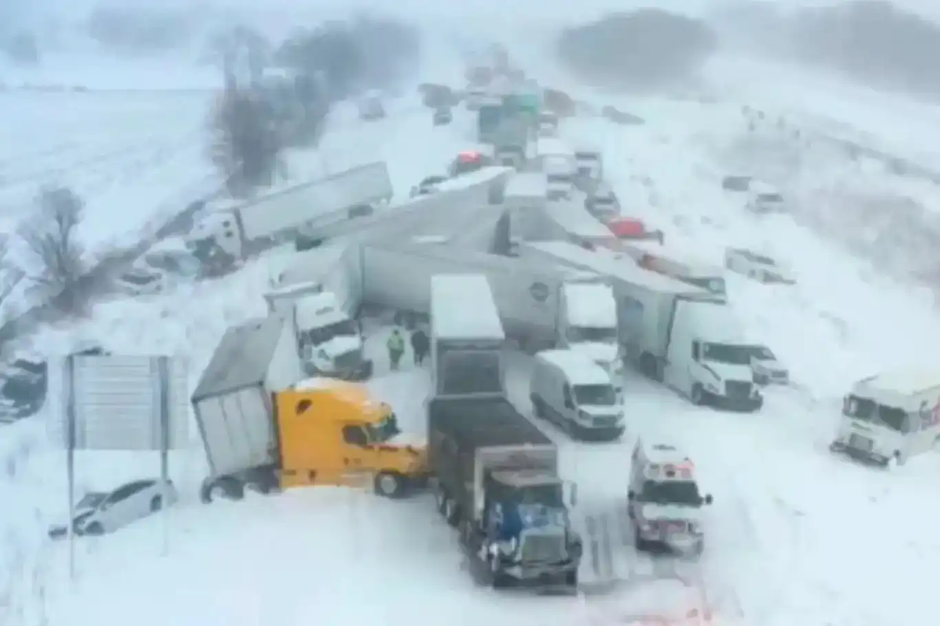 100 vehicles pile up in Michigan crash as snowstorm moves across United ...